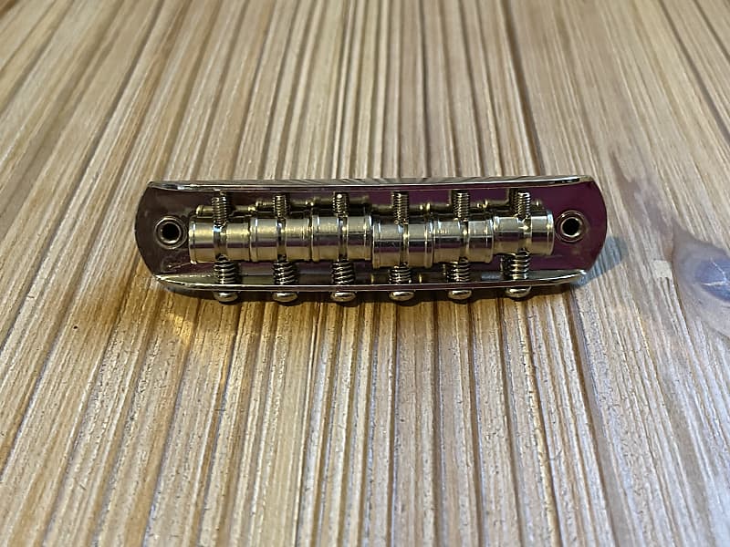 Fender Mustang Bridge, 9.5 radius, 72mm post spacing | Reverb