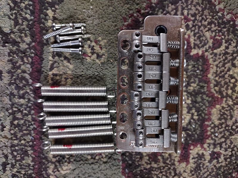 Reliced Wilkinson Stratocaster Bridge assembly with Raw | Reverb