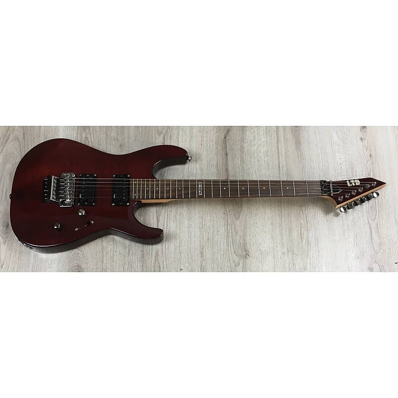 ESP LTD M-100FM See Thru Red con custodia | Reverb
