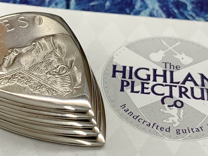 The Highland Plectrum Co. One Mexican Un Peso Coin Plectrum. | Reverb