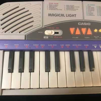 Casio ML-2 Magical Light Keyboard Mini Lighted Keys | Reverb