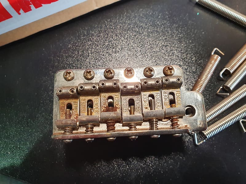 Fender Relic Aged Strat Bridge Nickel w/Block and screws. | Reverb