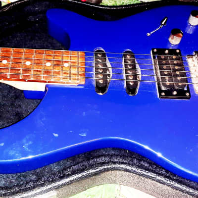 Rogue Rocketeer navy blue strat-style double cutaway guitar | Reverb