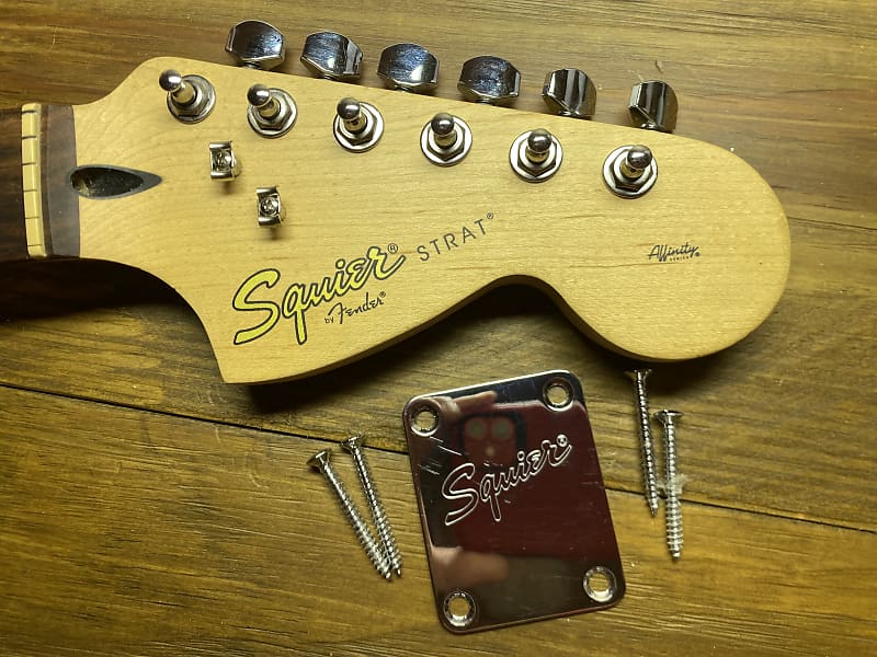 Squier loaded Stratocaster Neck PLATE AND SCREWS TUNERS AND | Reverb