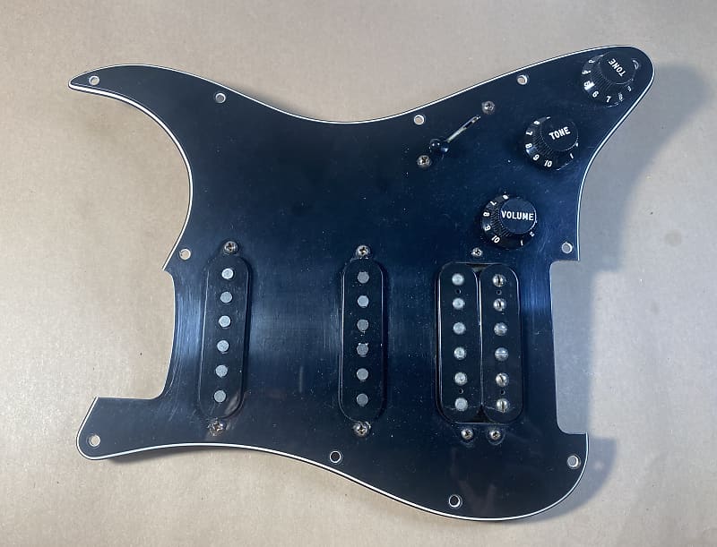 Black loaded pickguard with Fender pickups and back plate | Reverb