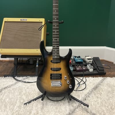 SAMICK banjos, koto, mandolins, zither, acoustic guitars, bass guitars ...