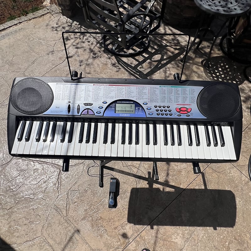 Casio CTK- 471 with stand and foot pedal | Reverb