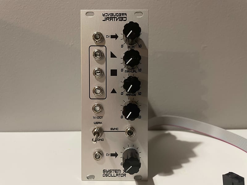 Frequency Central System X Oscillator Silver Reverb