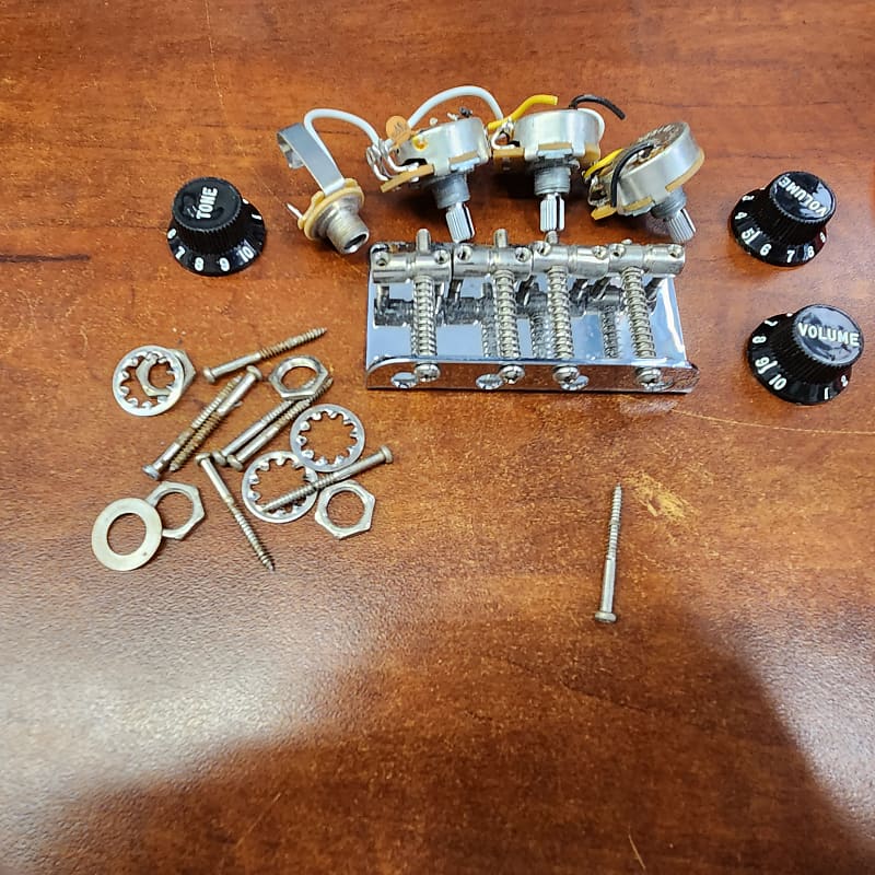 Fender Bass Bridge And Parts | Reverb