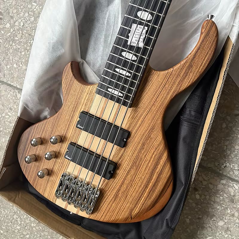 Custom Left Handed 6 String Electric Bass, Zebra Wood Top | Reverb