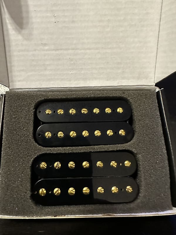 Guitarmory Polaris 7 string set gold poles - Black | Reverb