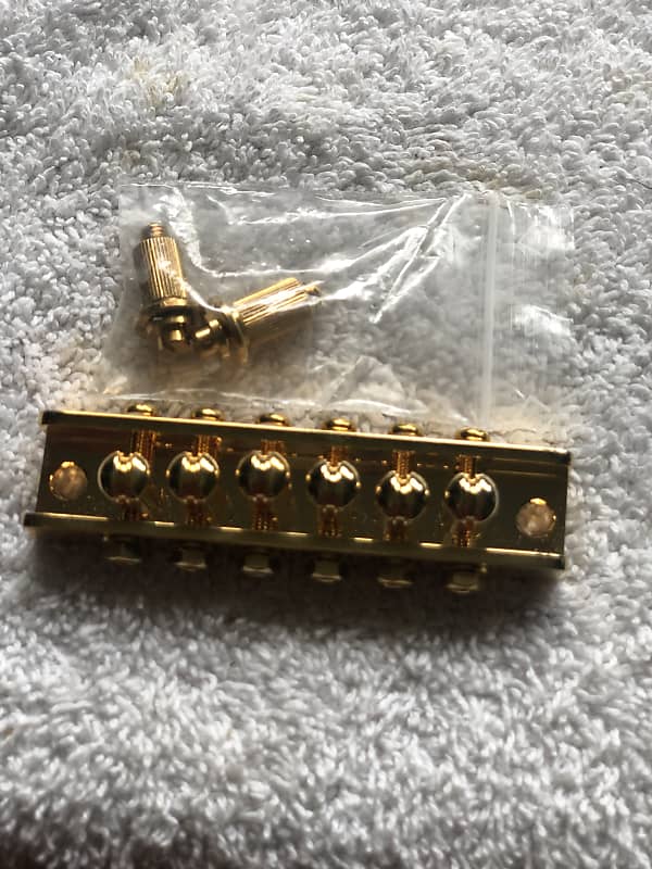 Gold roller bridge | Reverb