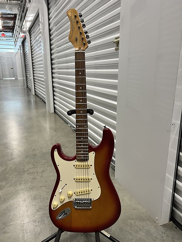 Hondo Stratocaster left handed 1988 Honey burst | Reverb