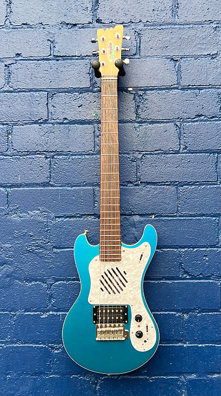 Marine Rider Mini Mosrite with in-built amp - MIJ - 1990s - | Reverb