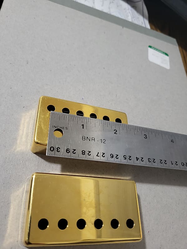 Matched pair of gold humbucker pickup covers non Gibson | Reverb