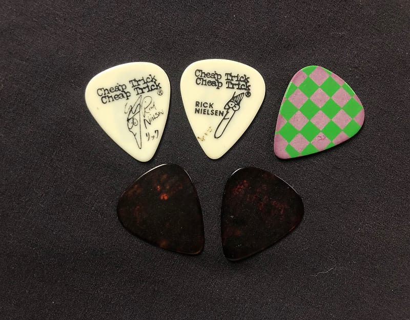 5 official Cheap Trick guitar picks. 2 are Rick Nielsen image | Reverb