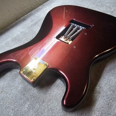 Squier 40th anniversarry stratocaster body Ruby red metallic | Reverb