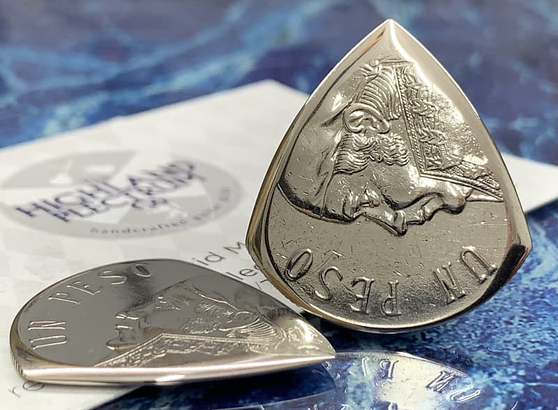 The Highland Plectrum Co. One Mexican Un Peso Coin Plectrum. | Reverb