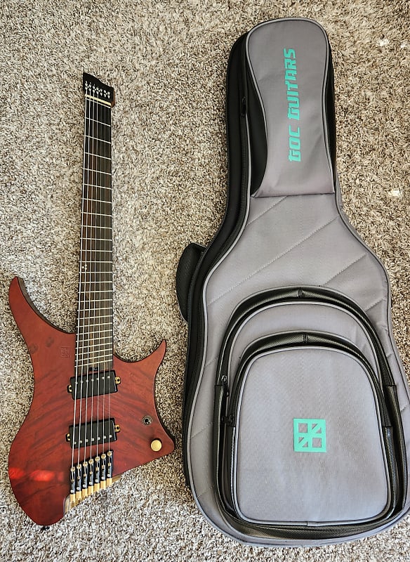 GOC Guitars Materia 7 E Class 2021 Worn Red Flame Headless 7 | Reverb