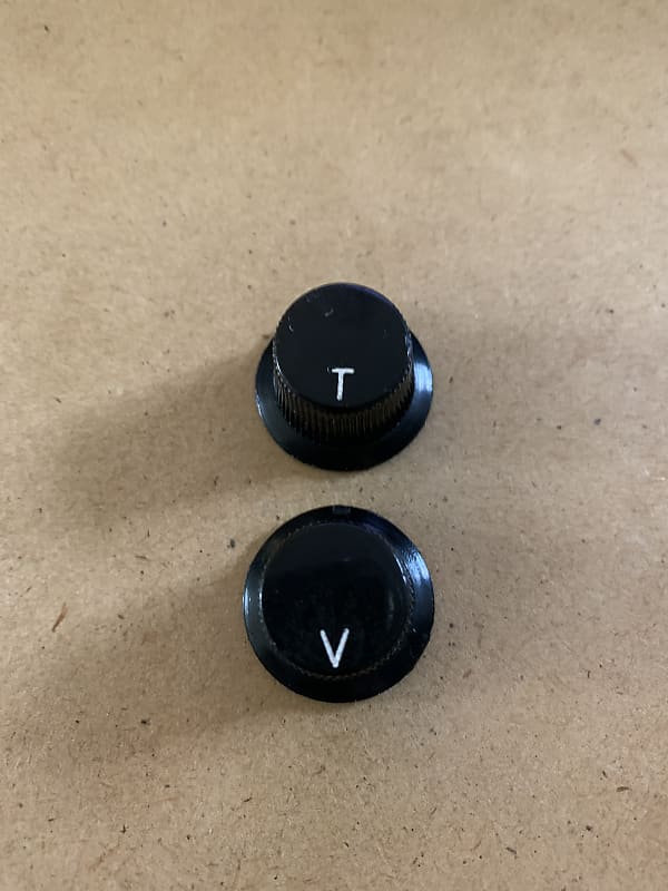 Pair of Teisco guitar knobs | Reverb