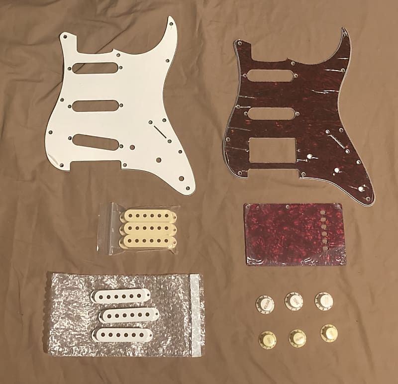 Strat Style Guitar Parts Lot, Pickguards, Pickup Covers, and | Reverb