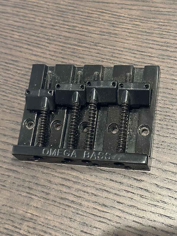 Omega Omega bass bridge 2018 - Black | Reverb