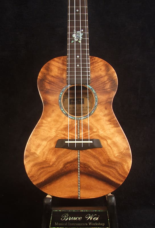 Bruce Wei Solid Curly Acacia Concert Ukulele, Hibiscus inlay | Reverb
