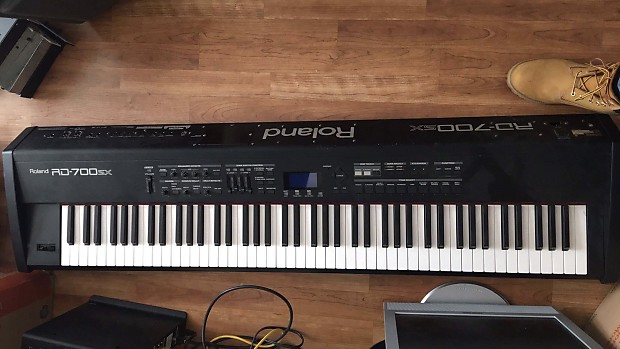Roland RD700 Digital Keyboard. 88 keys Aged Black Satin | Reverb