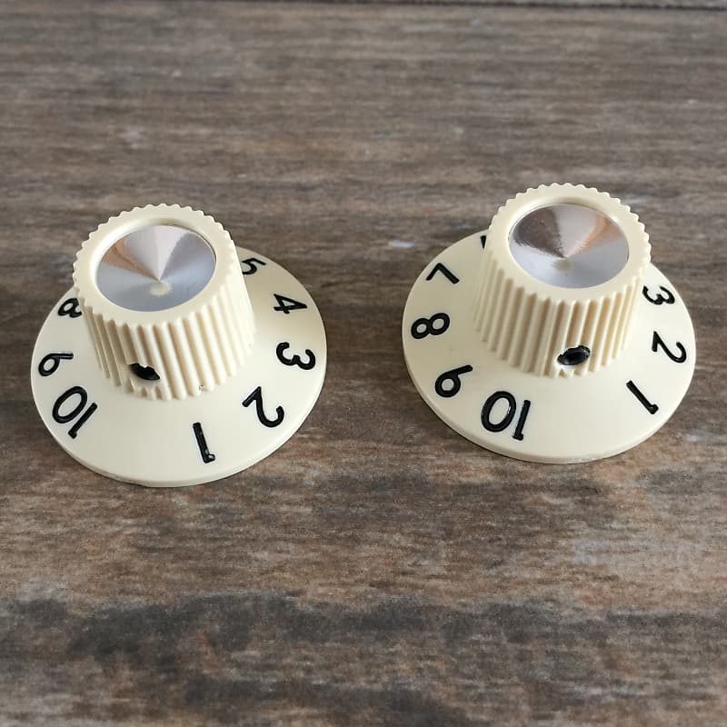 fender jaguar white knobs