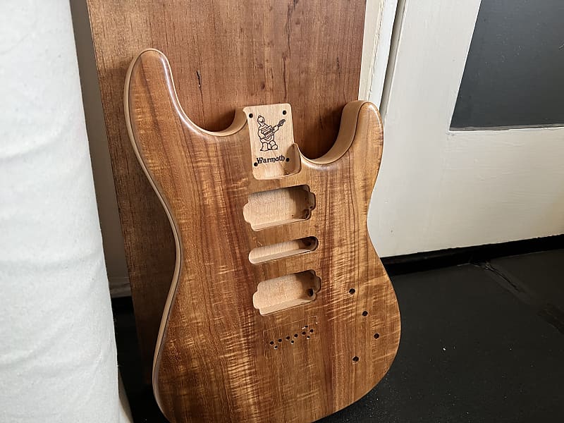 Warmoth Stratocaster flamed koa topped extra light body HSH | Reverb