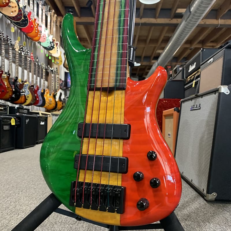 Roscoe 6-String Fretless "Jon Jon" Signature Rasta Bass | Reverb