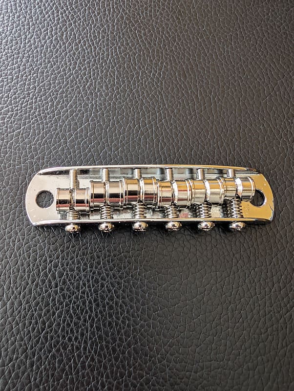 9.5" radius TOM Mustang style bridge | Reverb
