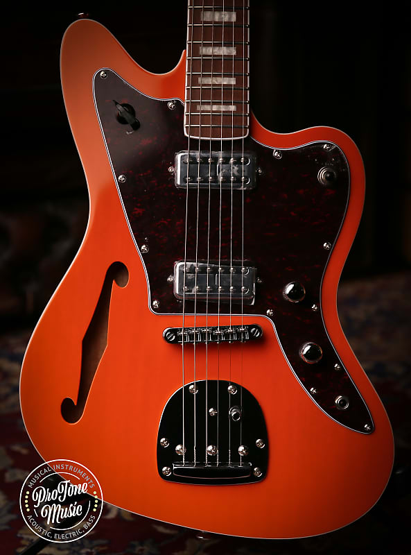 Vintage Revo Series Surfmaster Thinline Trans Orange | Reverb Canada