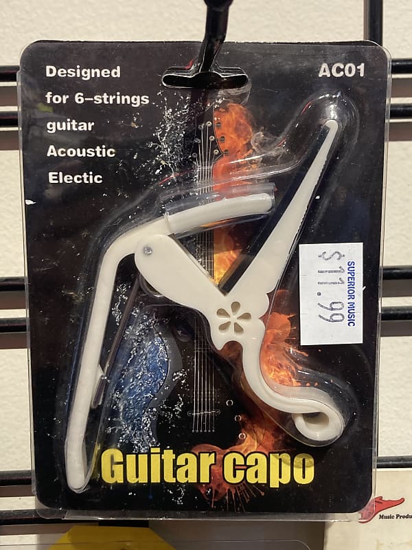 6 string acoustic / electric capo (new in box) | Reverb