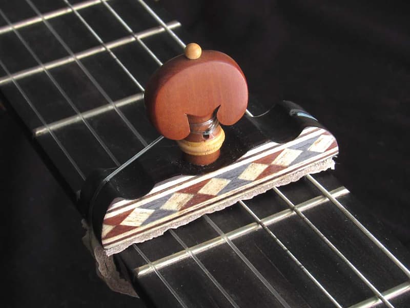 Handcrafted flamenco capo made of ebony and inlay from | Reverb