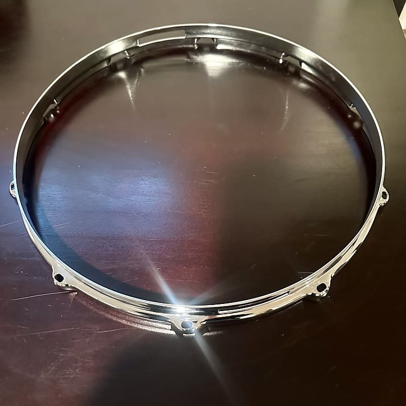 Unknown Chrome on BRASS snare side hoop, double flange 10 lug | Reverb