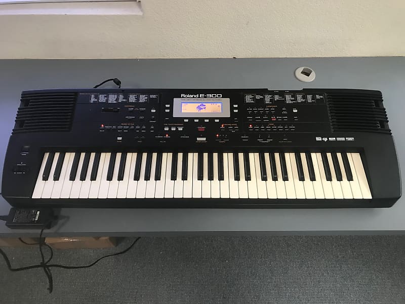 RARE Roland E-300 Intelligent 61-Key Keyboard w/ Stand. | Reverb