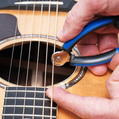 Music Nomad GRIP ONE - All in ONE String Winder, Cutter, | Reverb