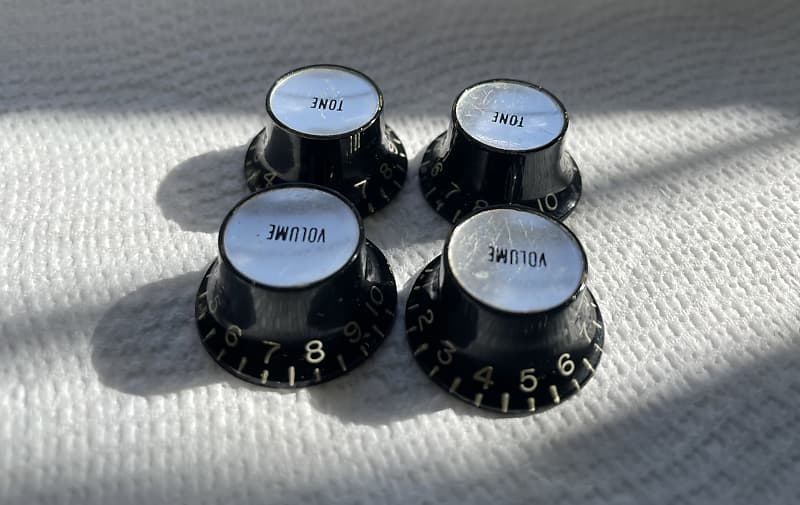 1960’s vintage Gibson Black reflector knobs with Nickel | Reverb