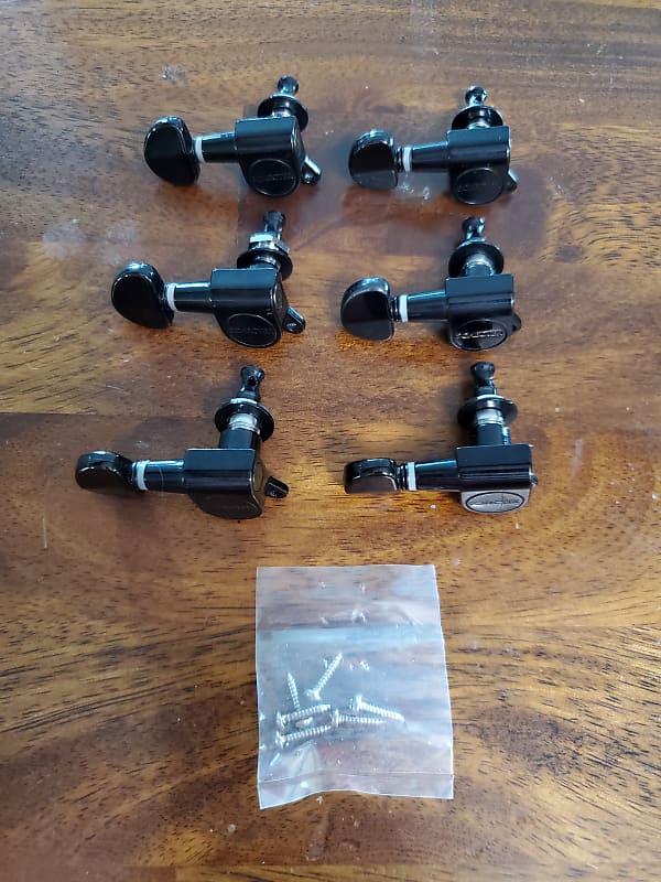 Schecter Left handed/reverse Headstock Black | Reverb