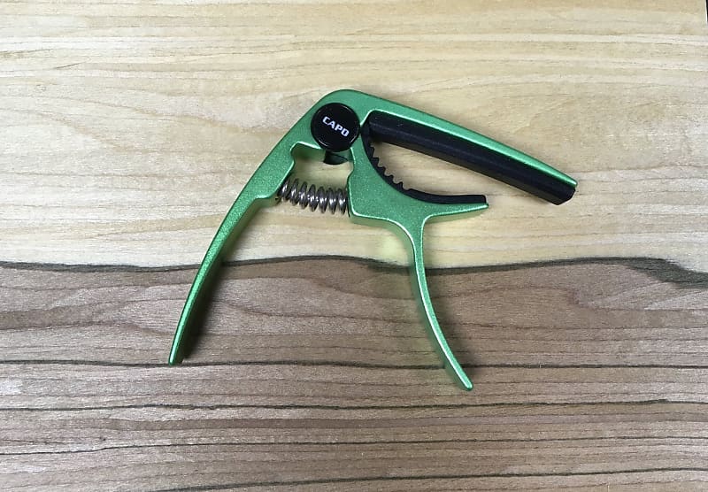 Green acoustic / electric guitar capo | Reverb