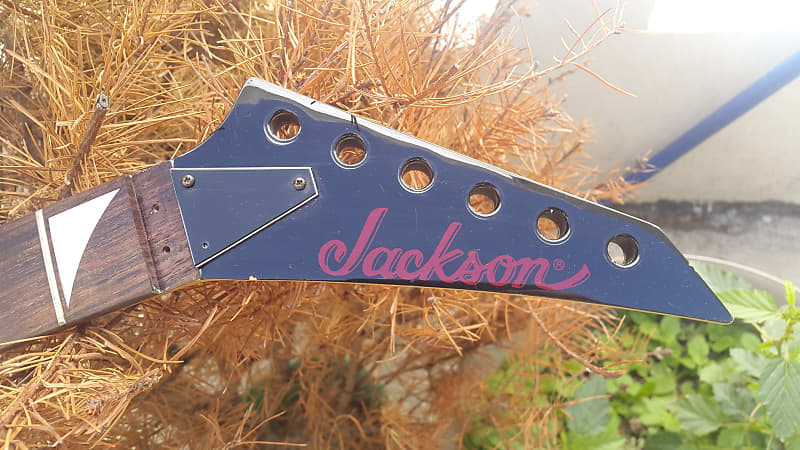 Jackson RARE guitar neck with RED logo and shark tooth inlays | Reverb