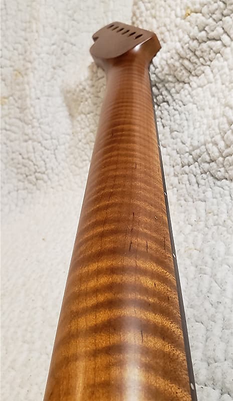 Impressive USA Roasted flame maple neck with Nitro finished | Reverb