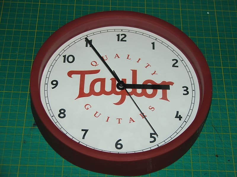 Taylor Guitars wall clock ..10" diameter...quartz | Reverb