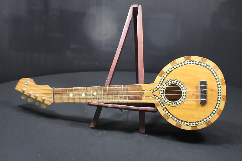 A Vintage Four String Coconut Shaped Ukulele in Great Ready | Reverb