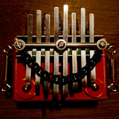 kalimba/noise box/percussion/noise instrument/metal | Reverb