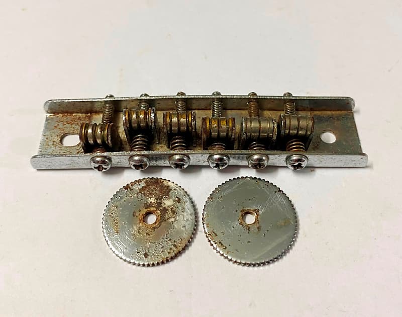 1960s Teisco style roller bridge for Archtop brass | Reverb France