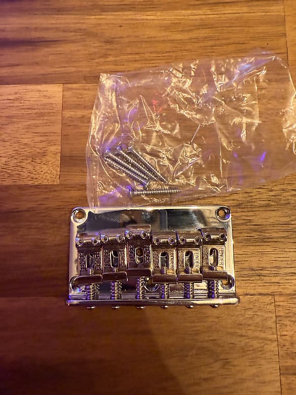 Gotoh Hard tail bridge with OEM Fender saddles - Chrome | Reverb